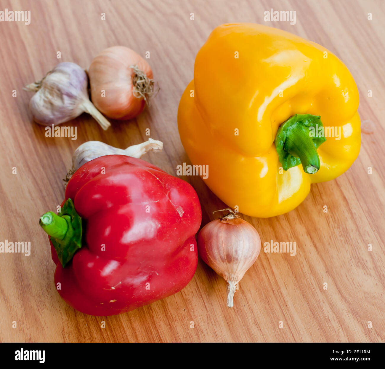 fresh sweet paprika on wood table Stock Photo - Alamy