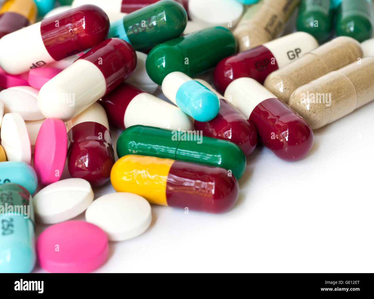 Colorful medical pills and capsules on white background Stock Photo - Alamy