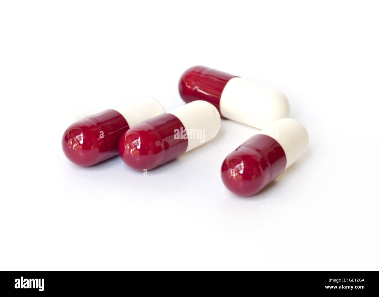 Colorful medical capsules on white background Stock Photo - Alamy