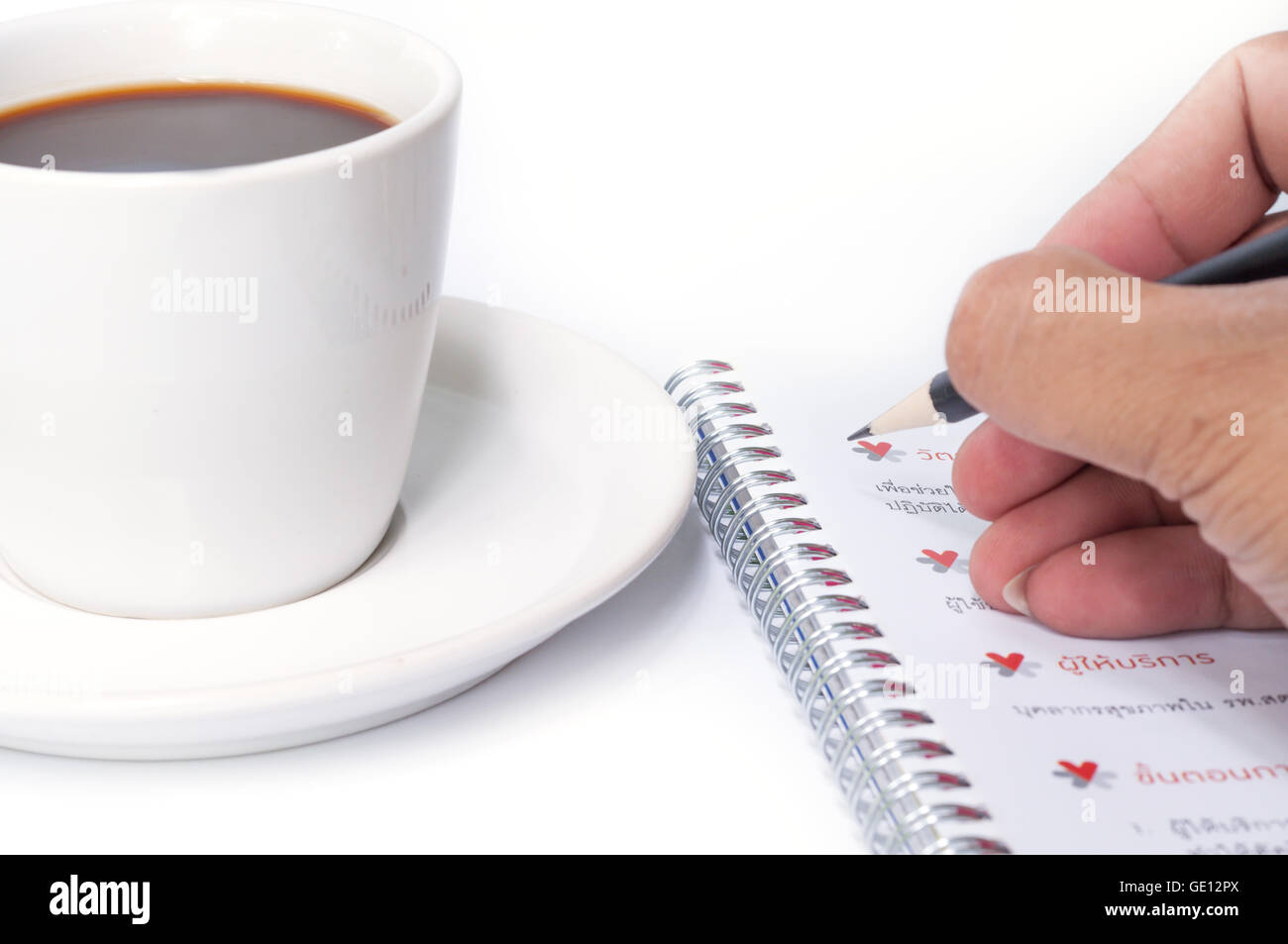 cup of coffee with hand writing notebook Stock Photo - Alamy
