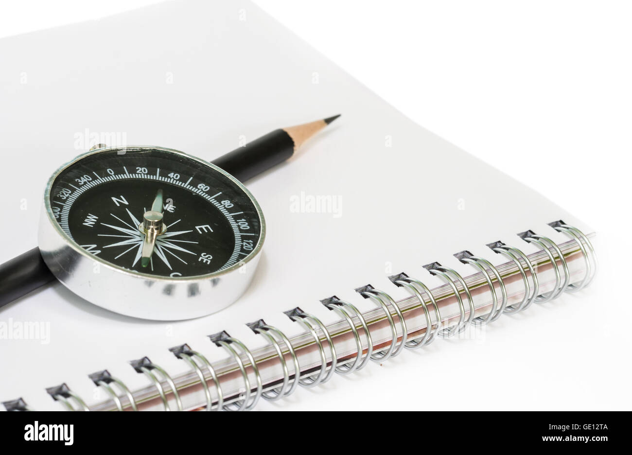 Book compass hi-res stock photography and images - Alamy