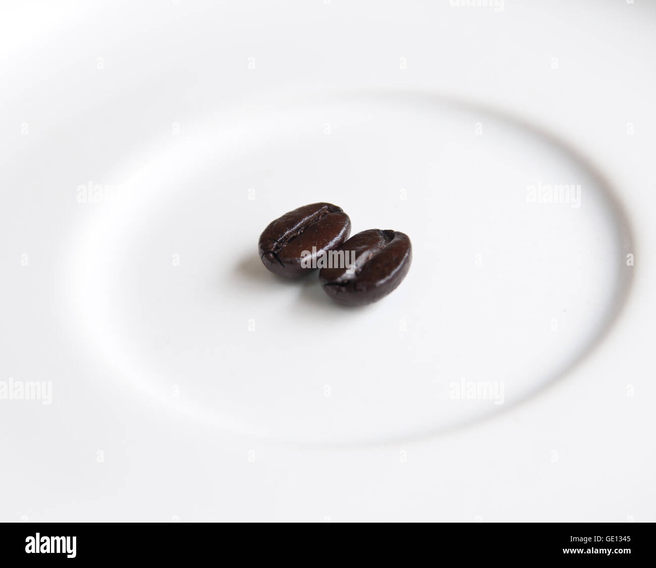 Coffee beans on a disk Stock Photo - Alamy