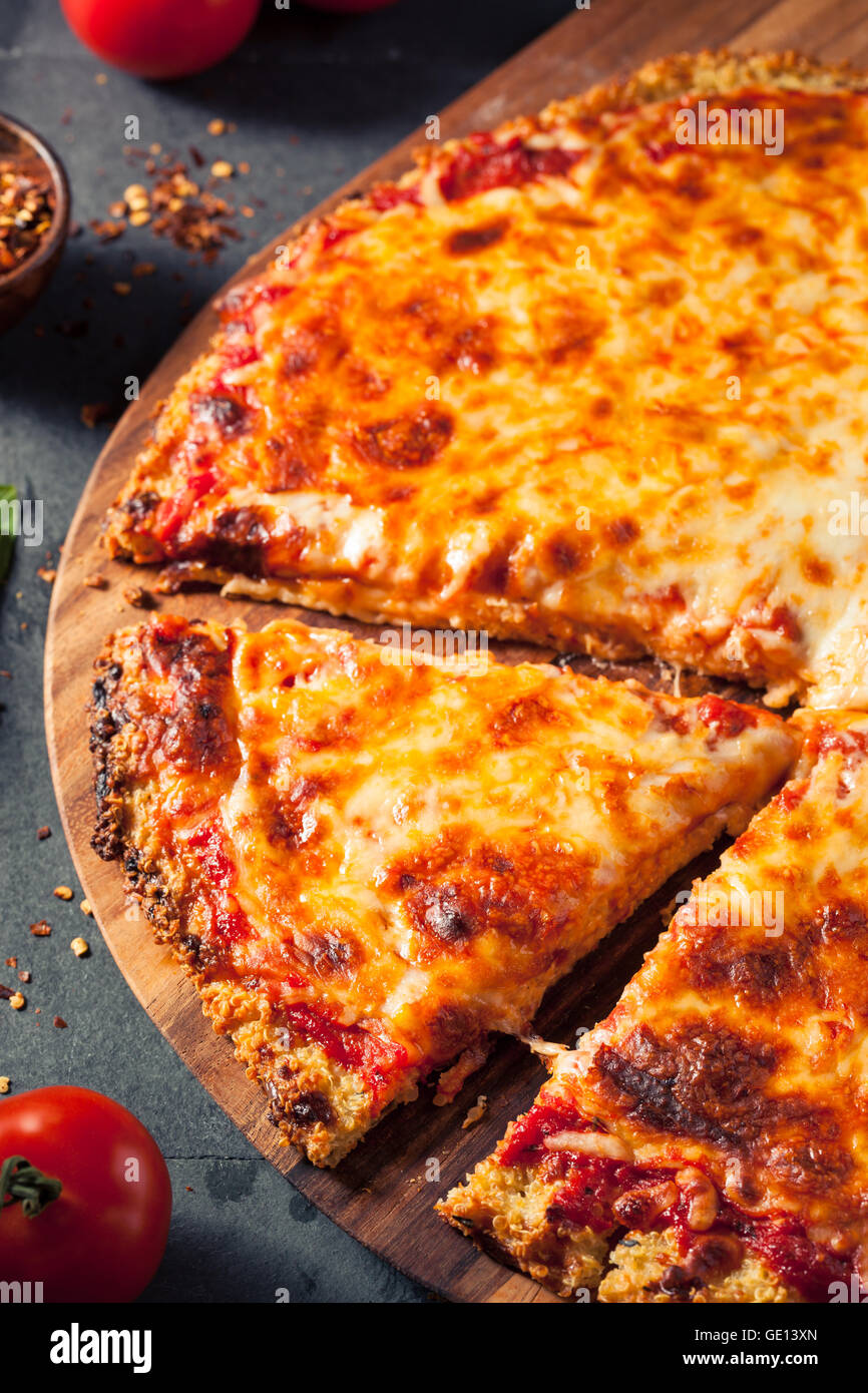 Healthy Homemade Quinoa Crust Cheese Pizza with Basil Stock Photo - Alamy