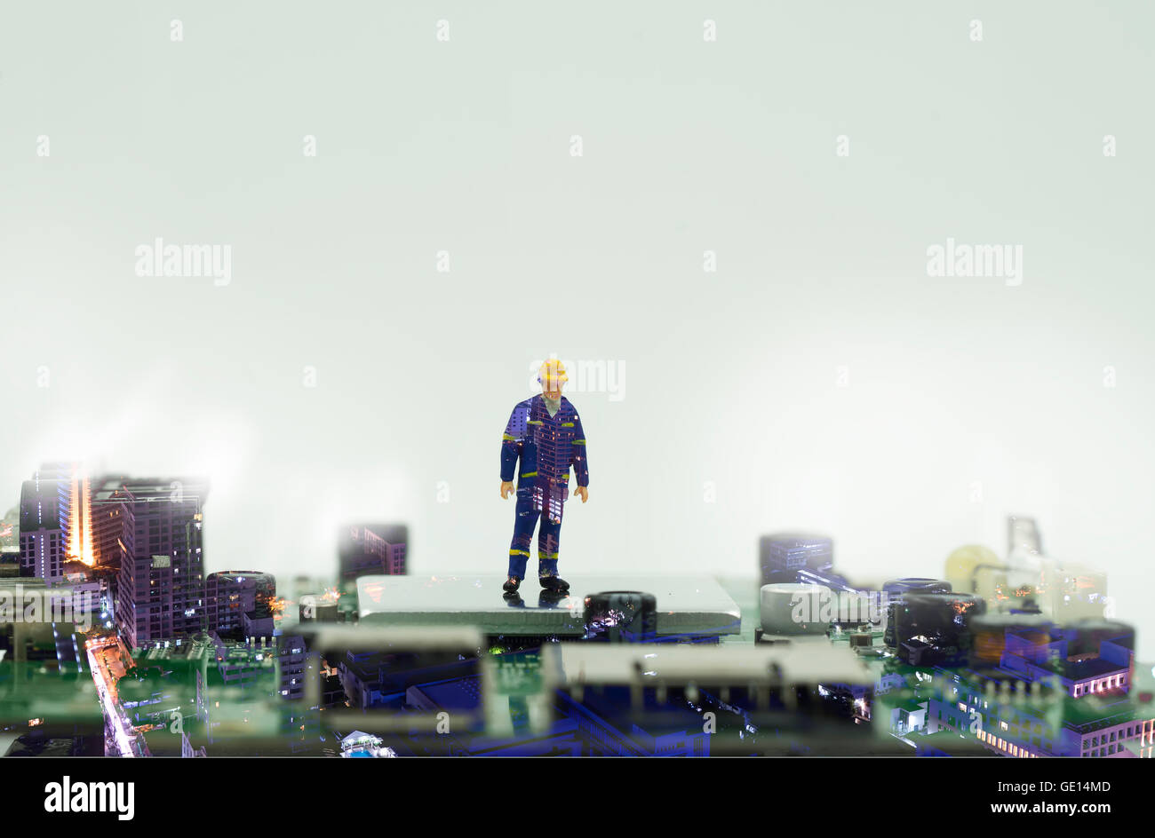 double exposure mini single engineer stand on mainboard cityscape - can ...