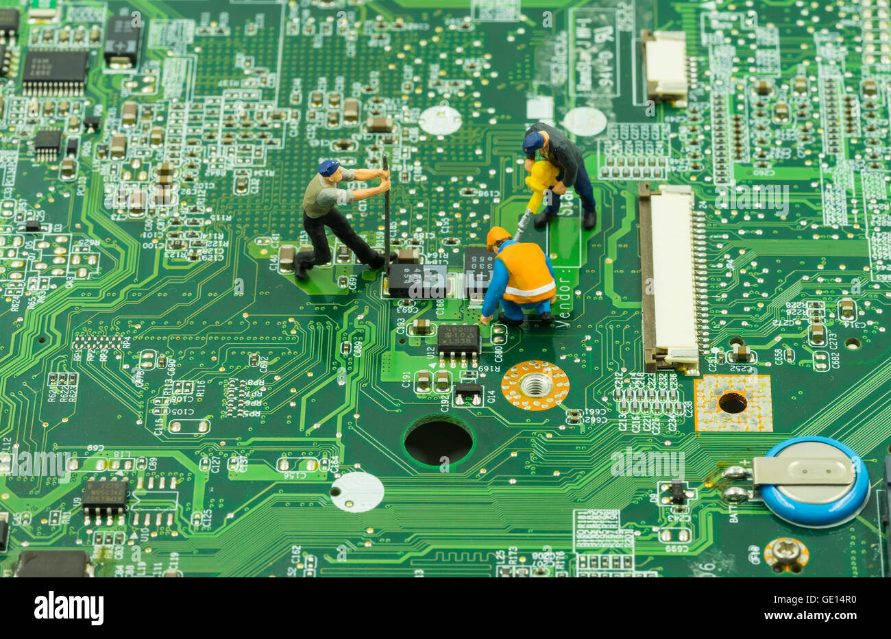 mini workers team try to maintain chip on mainboard - can use to ...