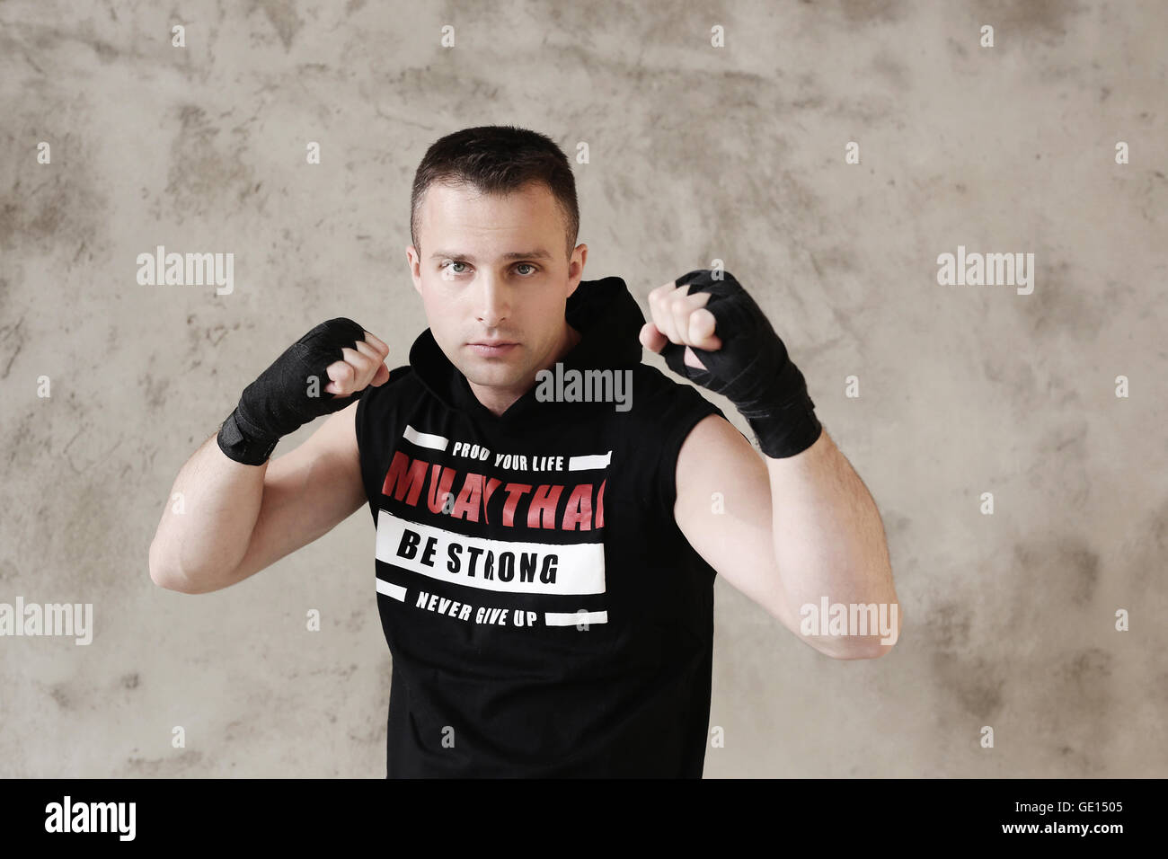 Young man boxing fighting pose hi-res stock photography and images - Alamy