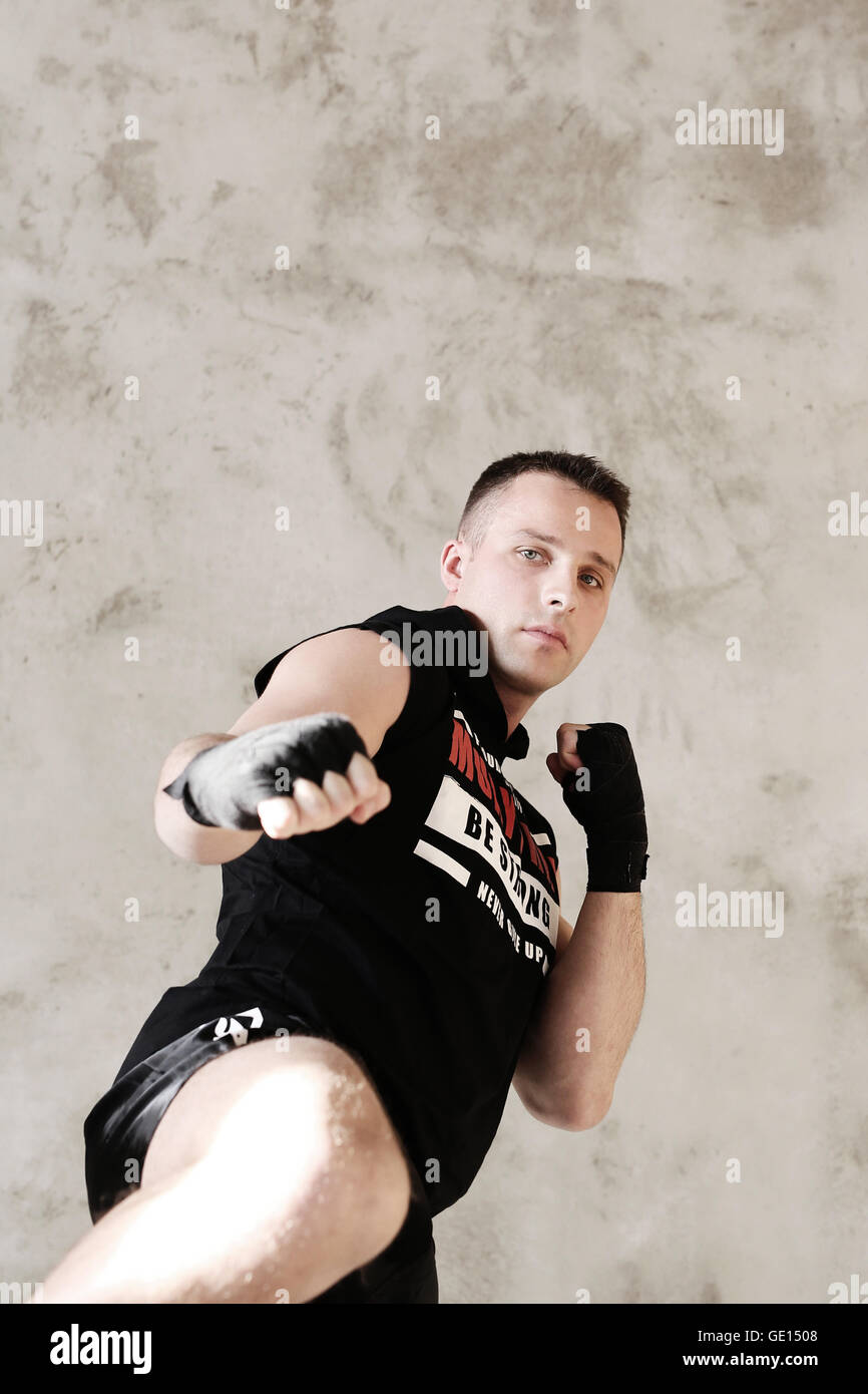 Young man boxing fighting pose hi-res stock photography and images - Alamy