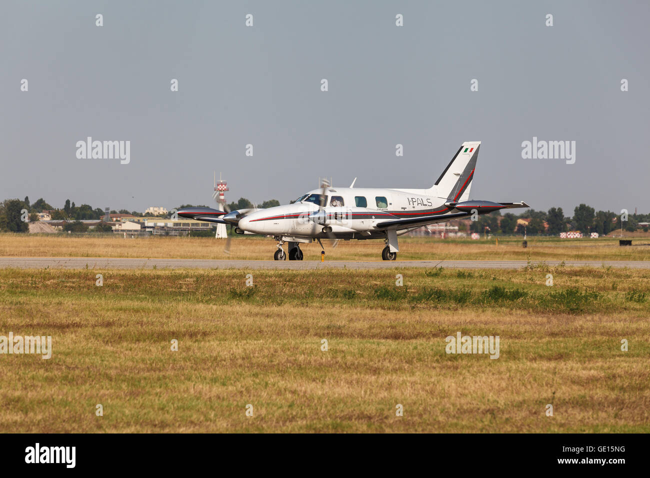 Small private airplane ready to takeoff on airport Guglielmo Marconi in ...