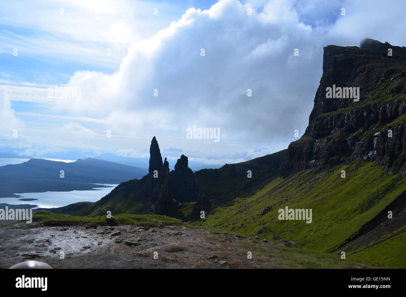Silhoutted highlands with towering rocks reaching to the clouds Stock ...