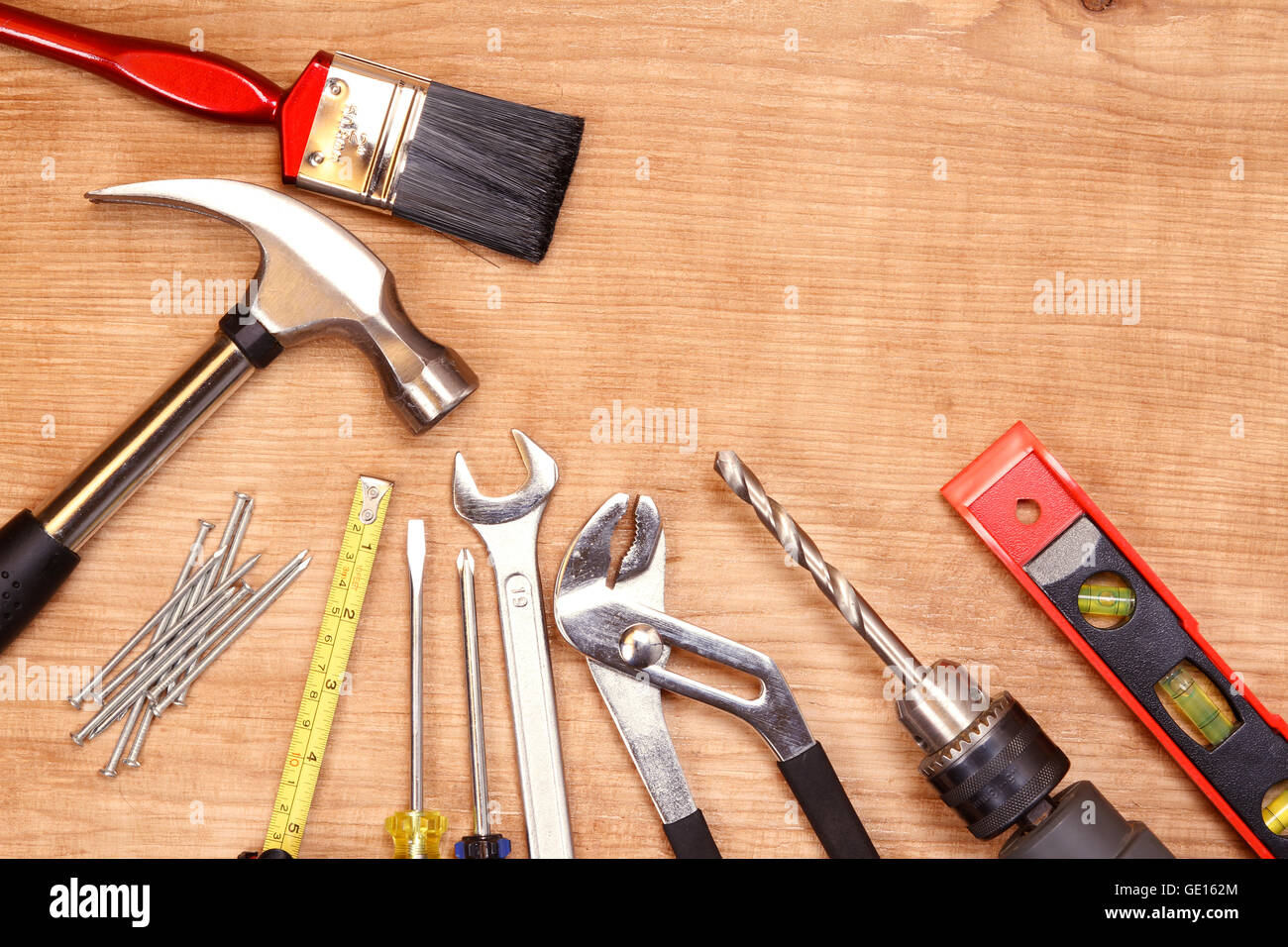 Assorted work tools on wood Stock Photo - Alamy