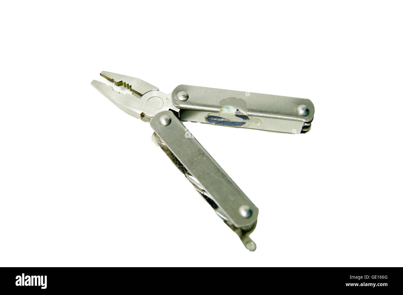 A mini multi tool with pliers folded out on a white background Stock ...