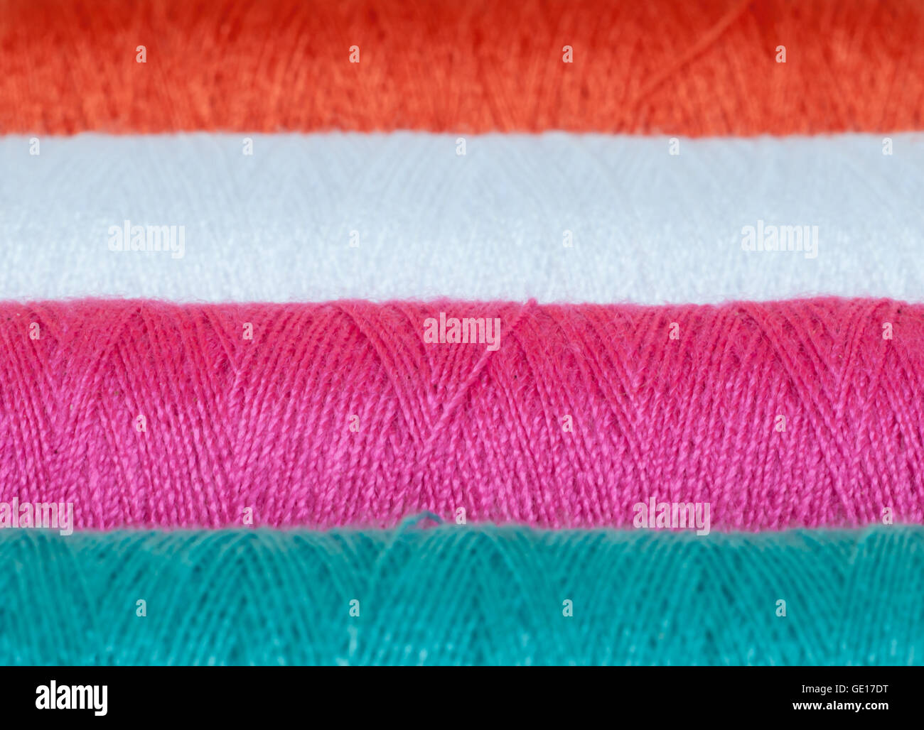 Close up of coloured thread background Stock Photo - Alamy