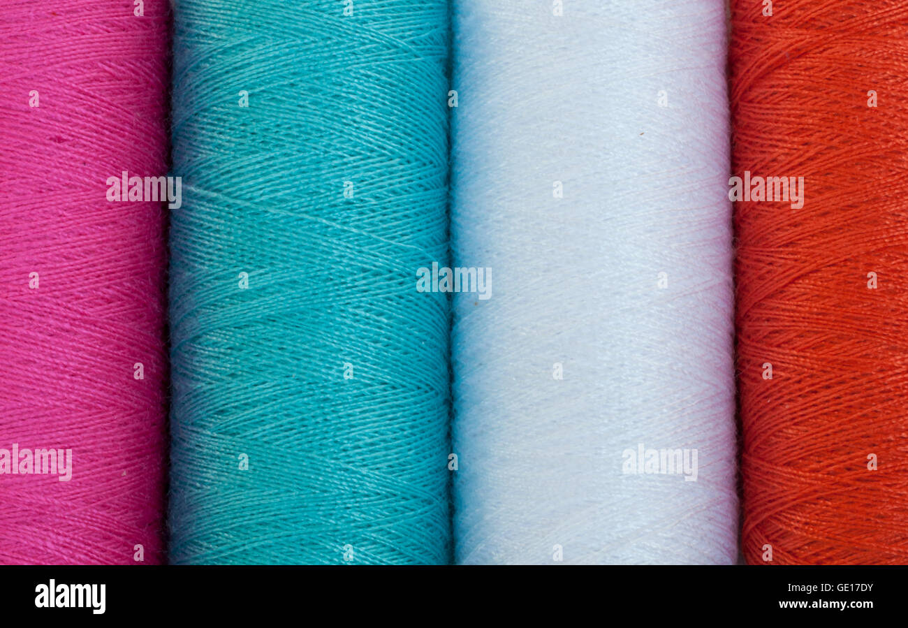 Close up of coloured thread background Stock Photo - Alamy