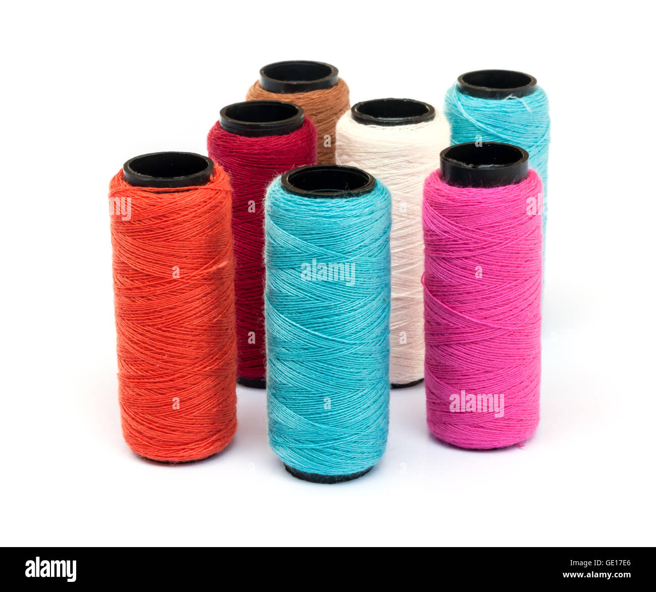 Spool of coloured thread isolated on white background Stock Photo - Alamy