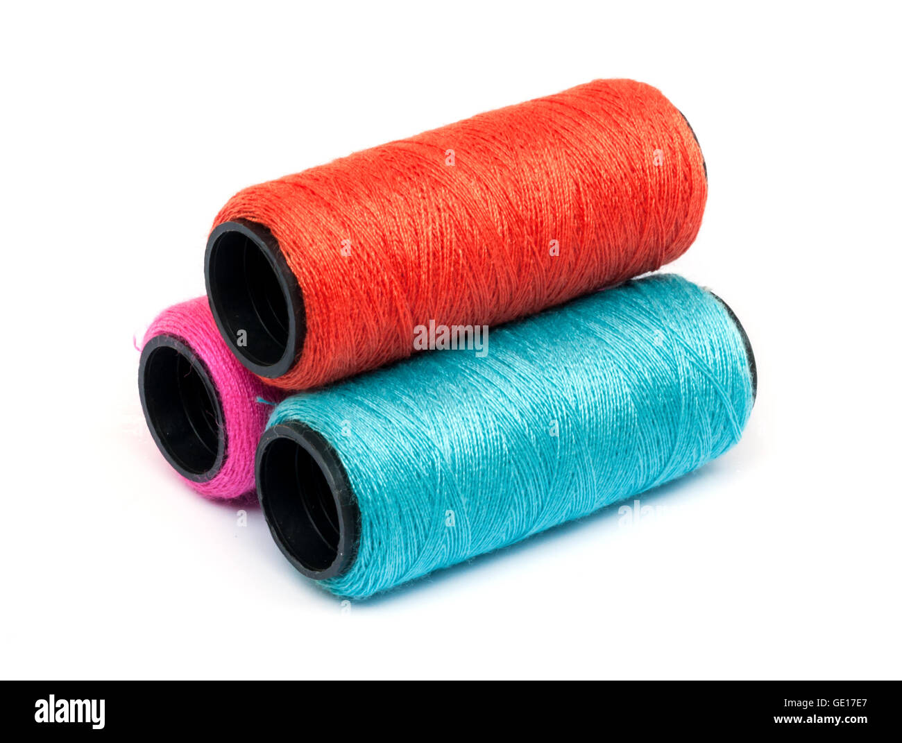 Spool of coloured thread isolated on white background Stock Photo - Alamy