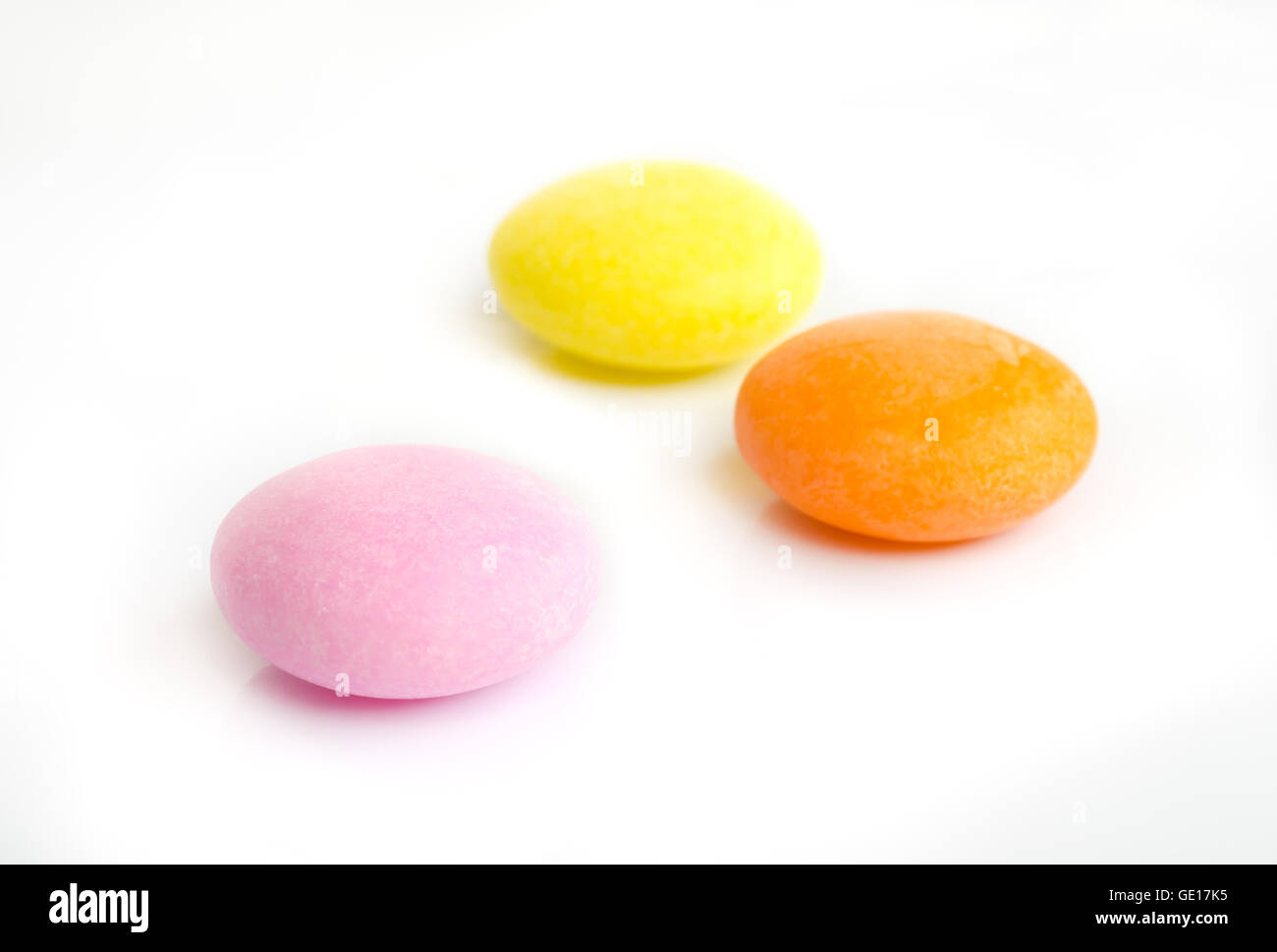 sweet color candy on white background Stock Photo - Alamy