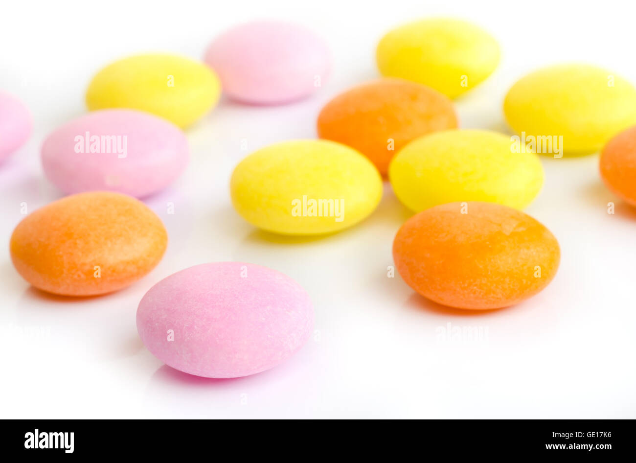 sweet color candy on white background Stock Photo - Alamy