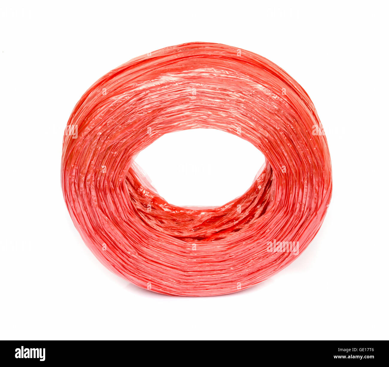 a bundle of plastic rope on white background Stock Photo - Alamy