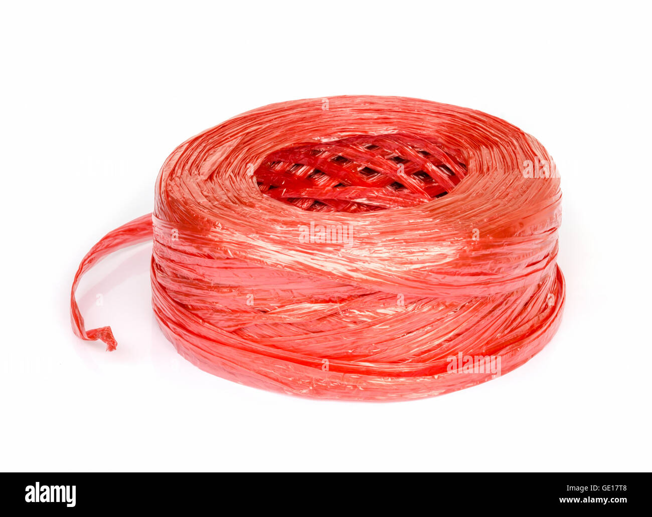 a bundle of plastic rope on white background Stock Photo - Alamy