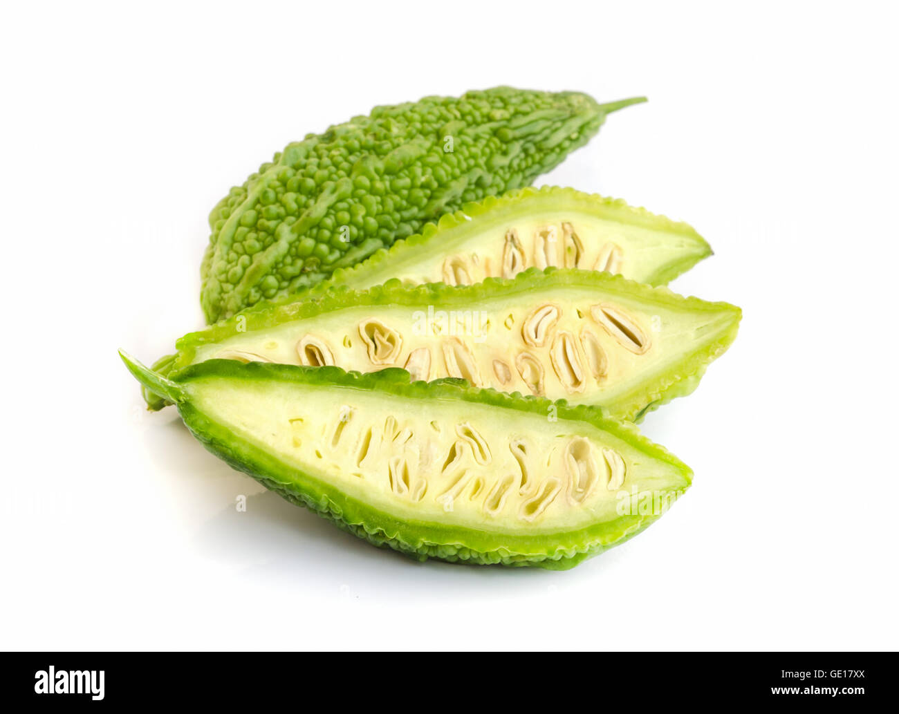 bitter gourd and slice on the white background Stock Photo - Alamy