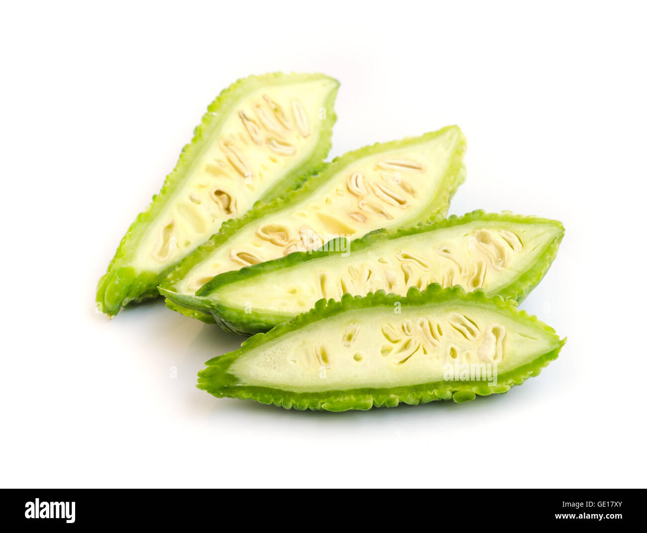 bitter gourd and slice on the white background Stock Photo - Alamy