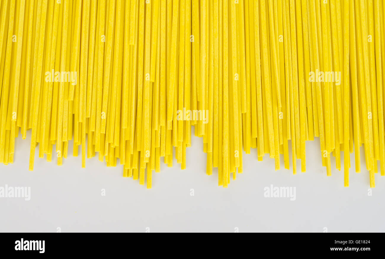 Background of uncooked italian spaghetti Noodles Stock Photo - Alamy