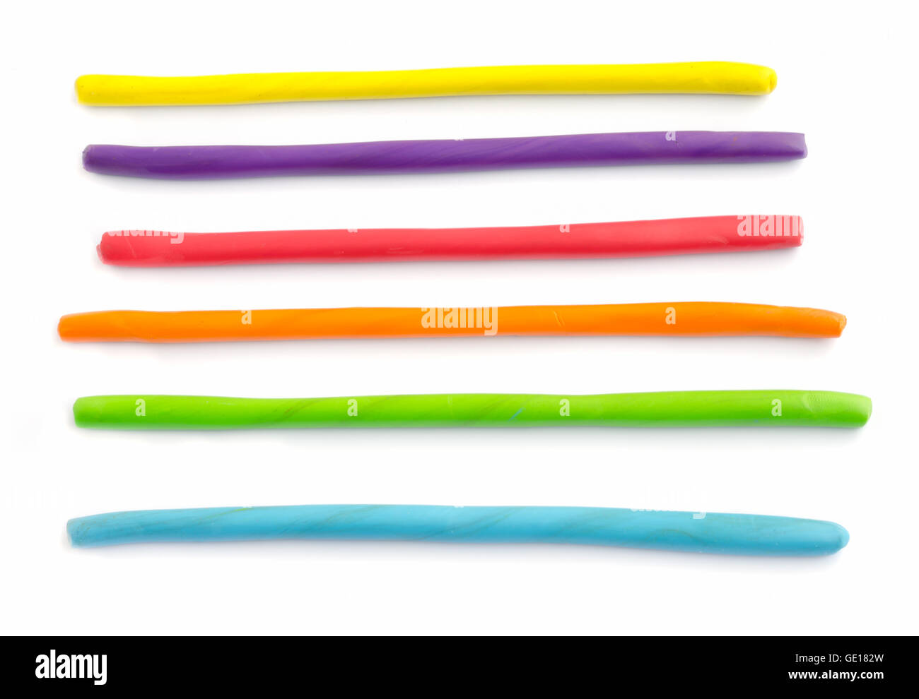 pieces of plasticine on white background Stock Photo - Alamy