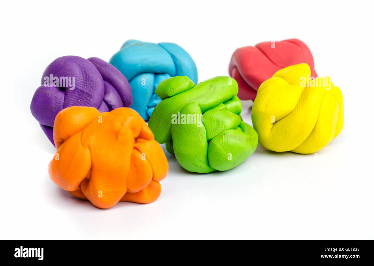 pieces of plasticine on white background Stock Photo - Alamy