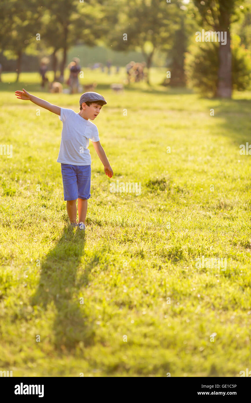 Boy messing outdoors hi-res stock photography and images - Alamy