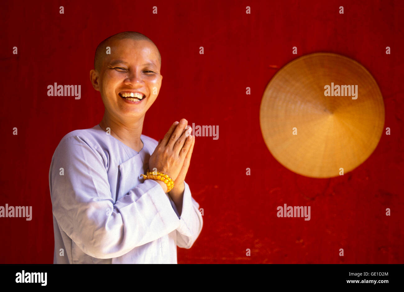 a women monk in a chinese temple in the city of Can Tho in the mekong ...