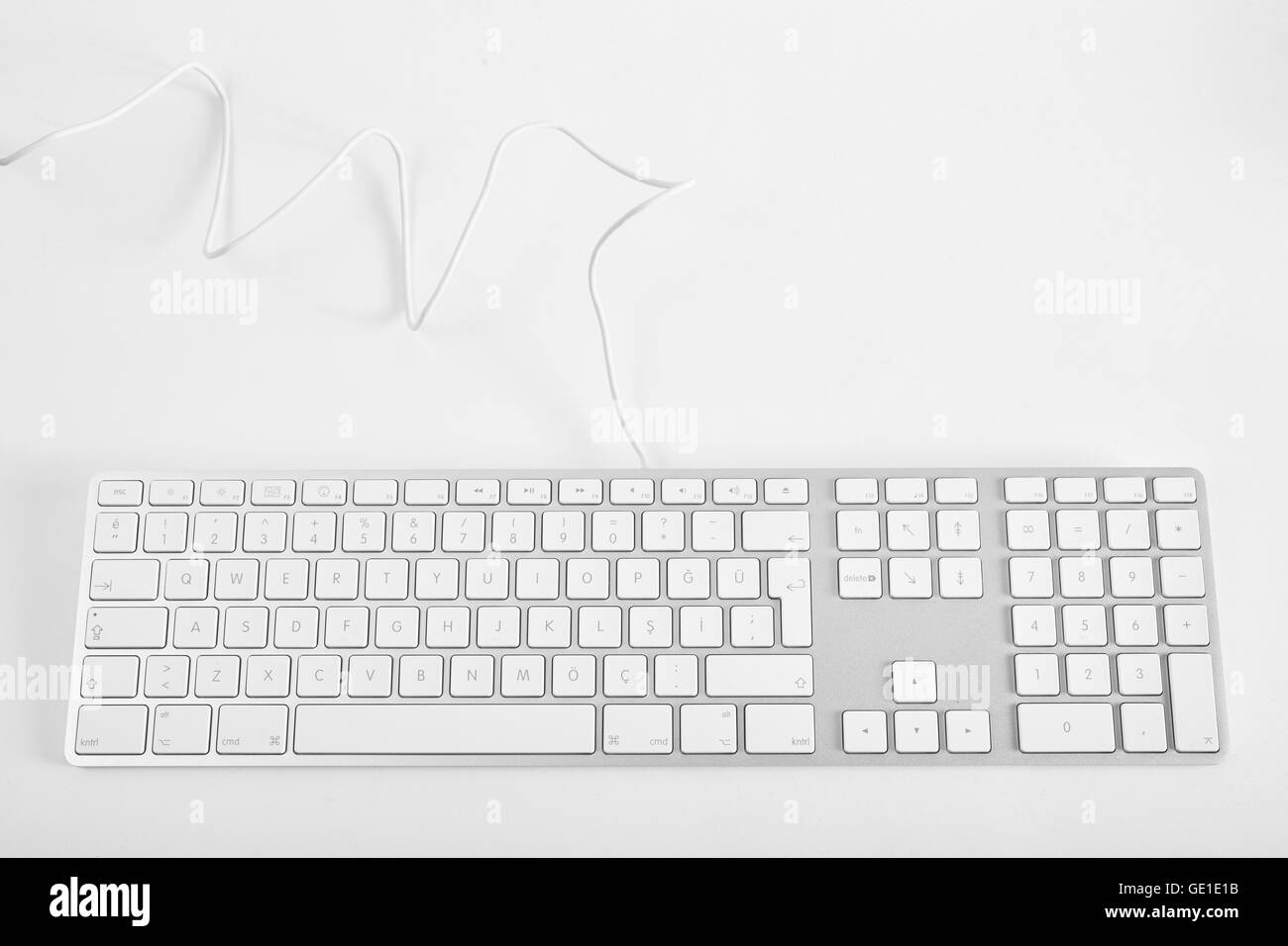 White computer keyboard on a white background Stock Photo - Alamy