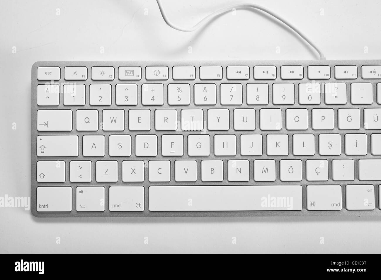 White computer keyboard on a white background Stock Photo - Alamy
