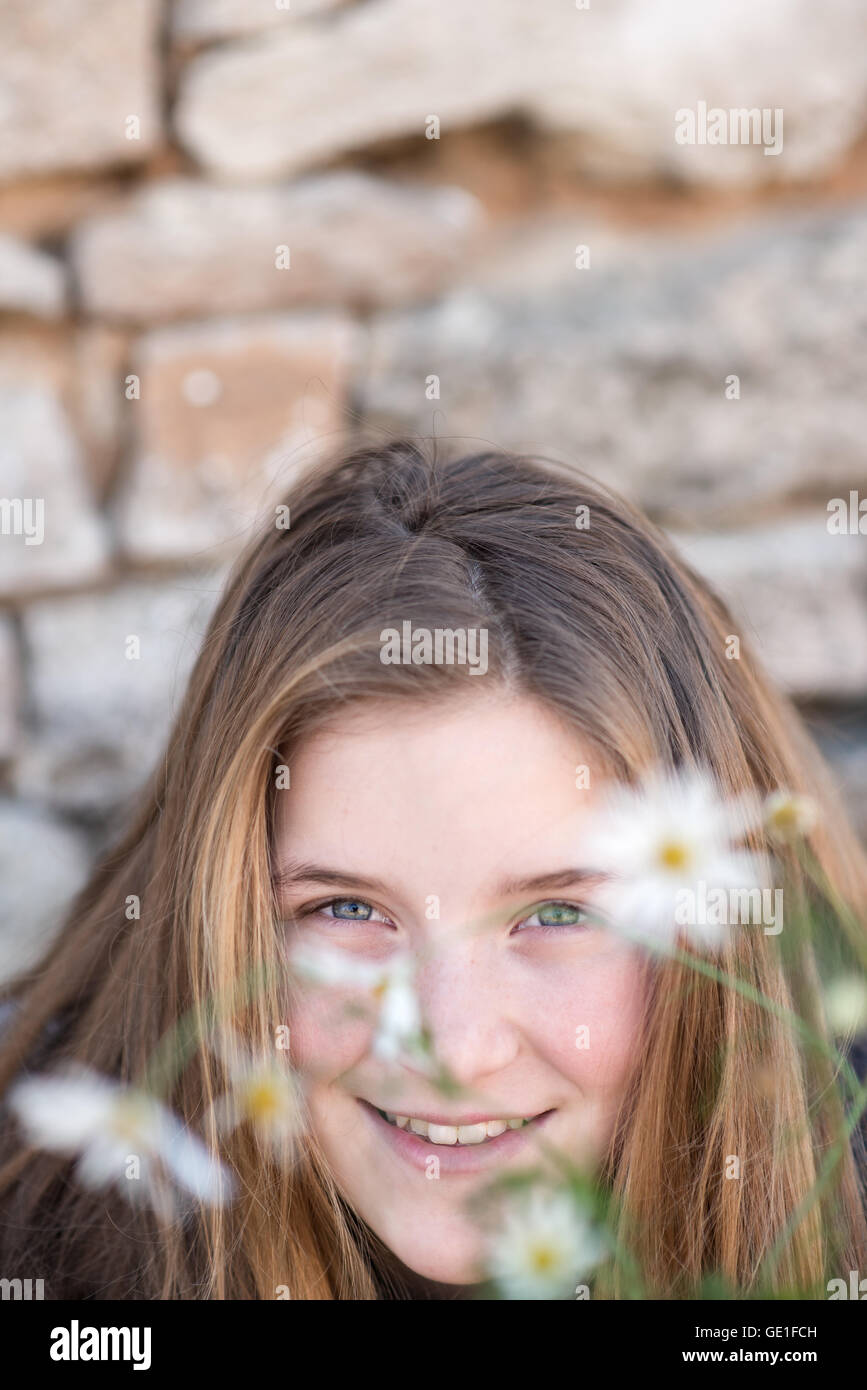 Girl picking up flowers hi-res stock photography and images - Alamy
