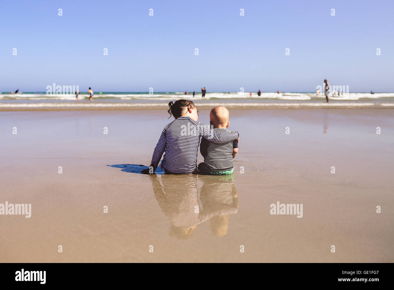 Sitting on arm hi-res stock photography and images - Alamy