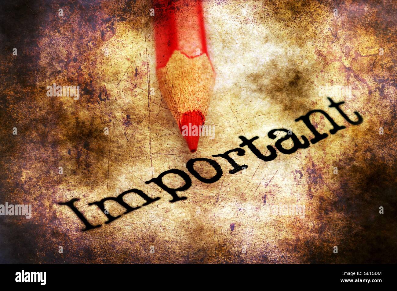 Pencil on important text Stock Photo - Alamy