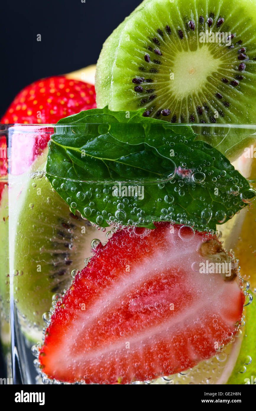 drink with ripe juicy fruits and peppermint leaves Stock Photo - Alamy