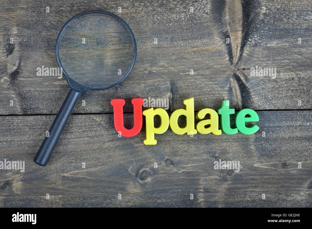 Update word on wooden table Stock Photo - Alamy