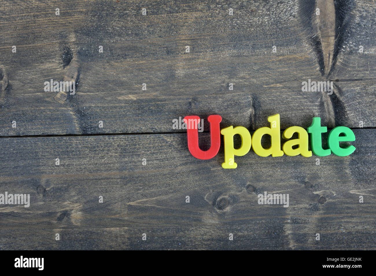 Update word on wooden table Stock Photo - Alamy