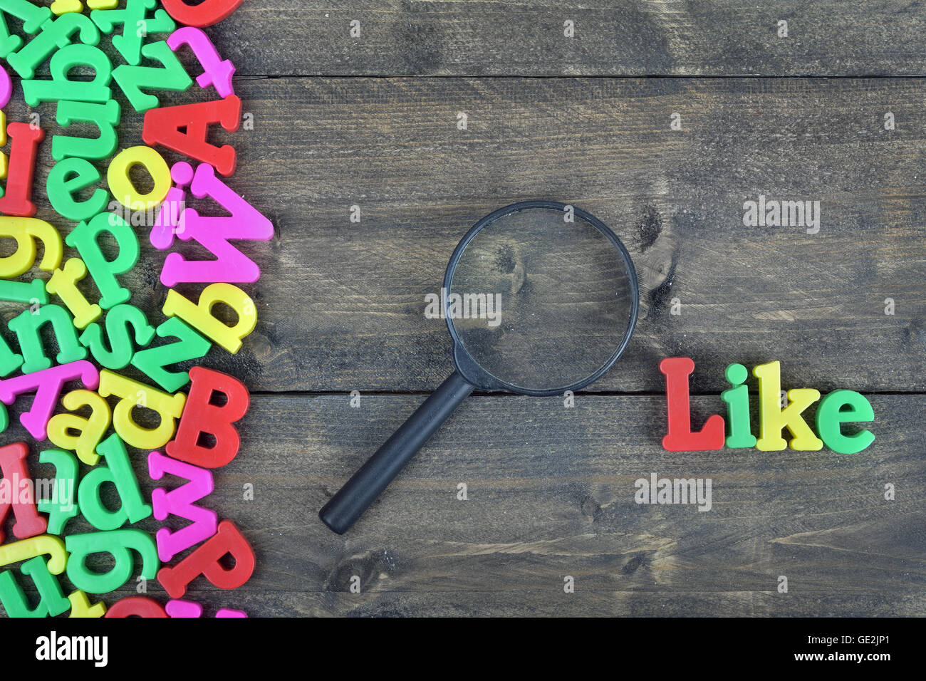 Like word on wooden table Stock Photo - Alamy
