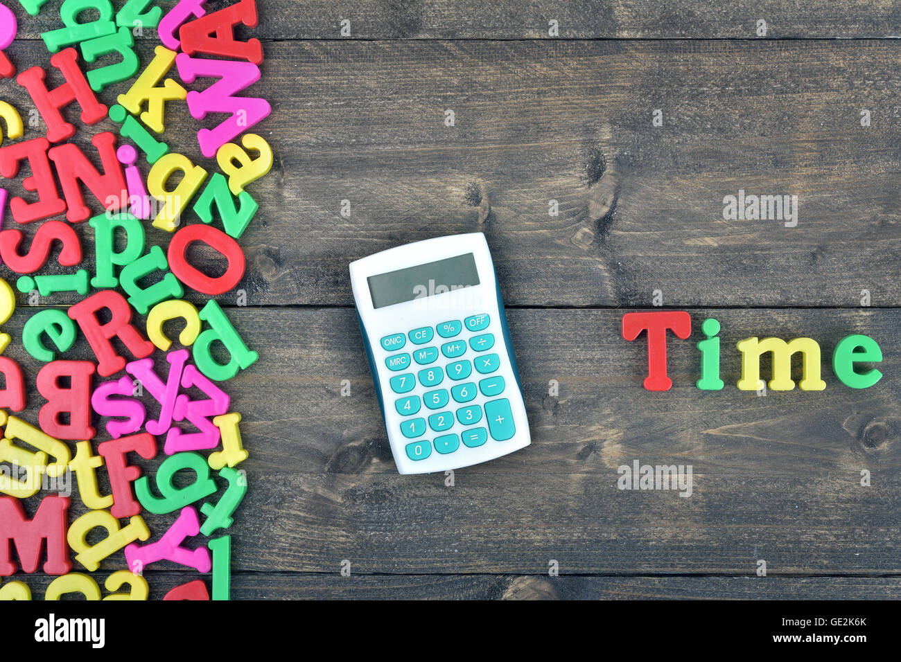 Time word on wooden table Stock Photo - Alamy