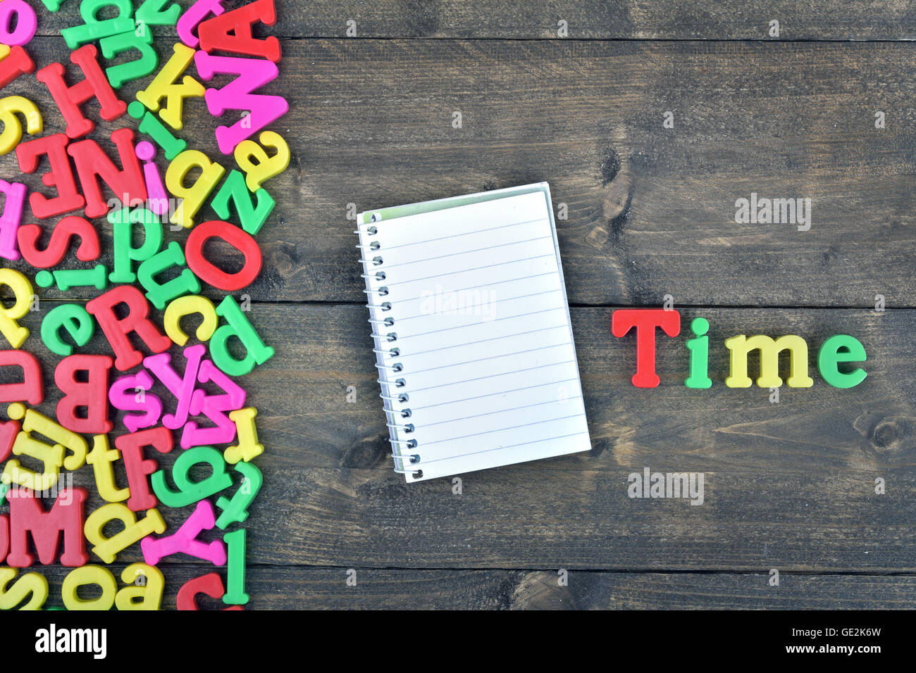 Time word on wooden table Stock Photo - Alamy