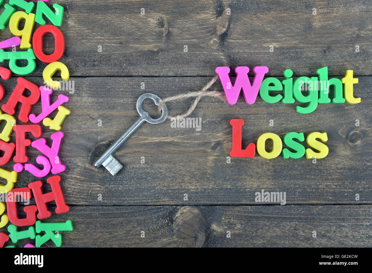 Weight loss word on wooden table Stock Photo - Alamy