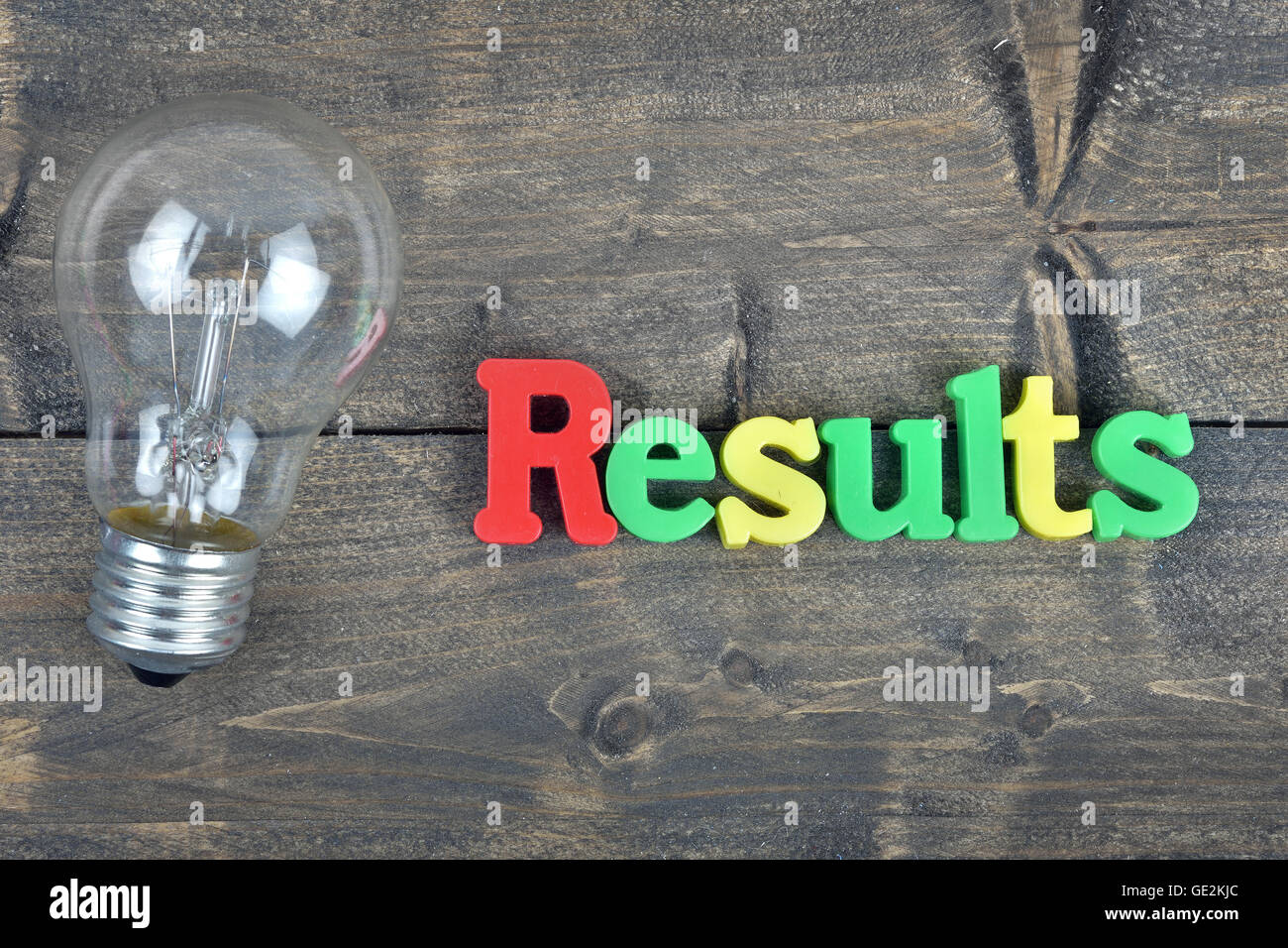 Results word on wooden table Stock Photo - Alamy