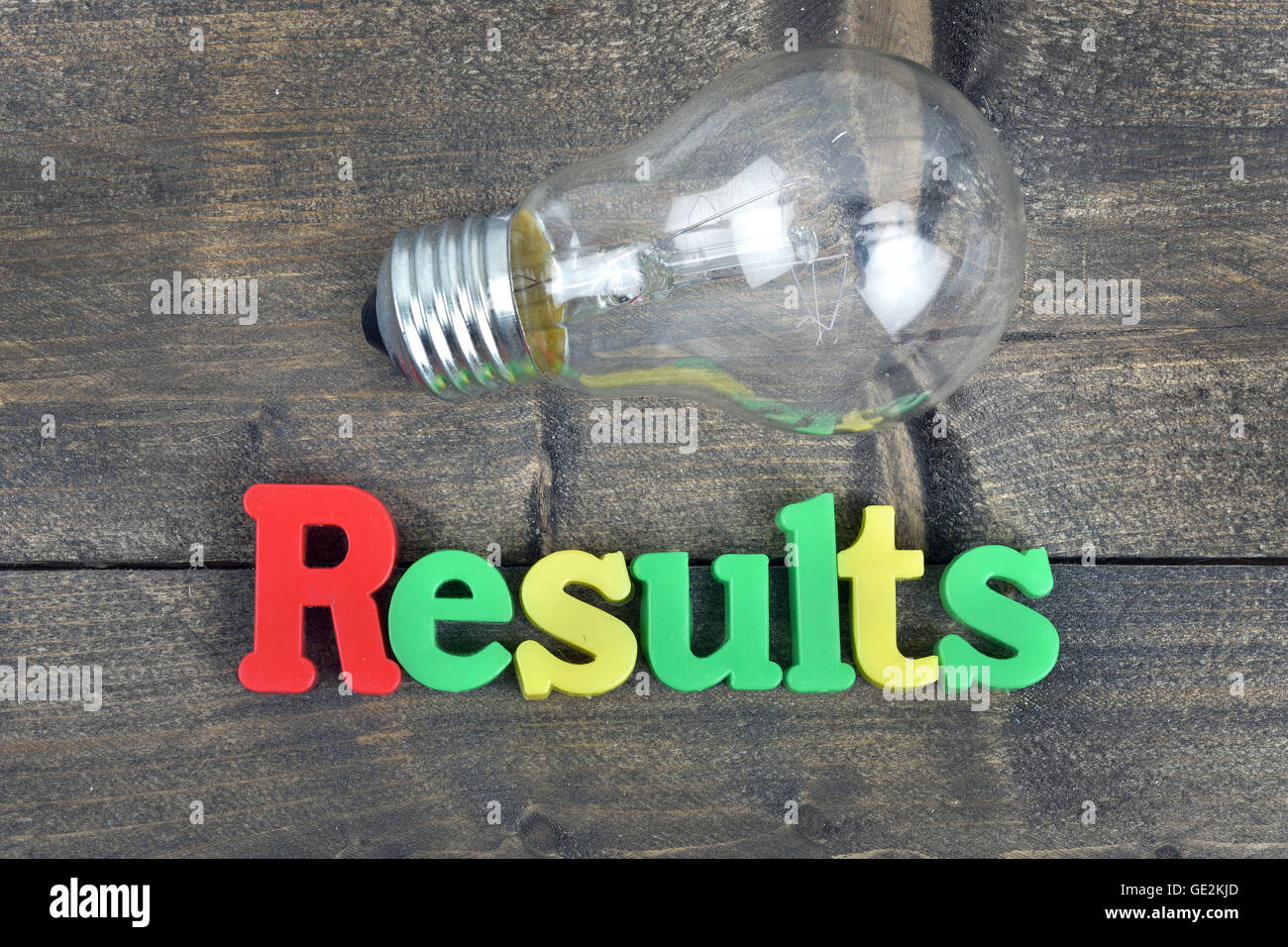 Results word on wooden table Stock Photo - Alamy
