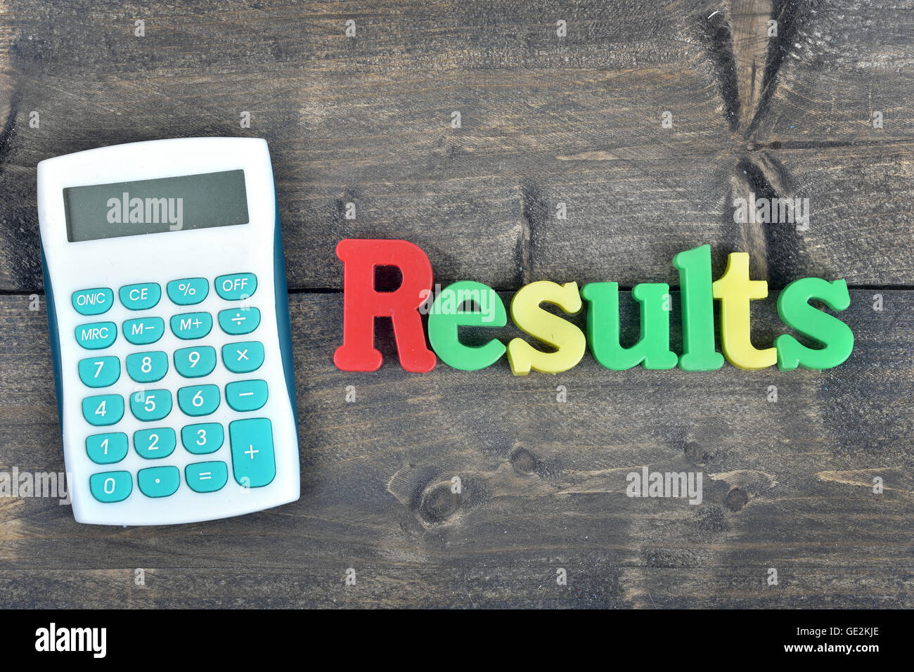 Results word on wooden table Stock Photo - Alamy