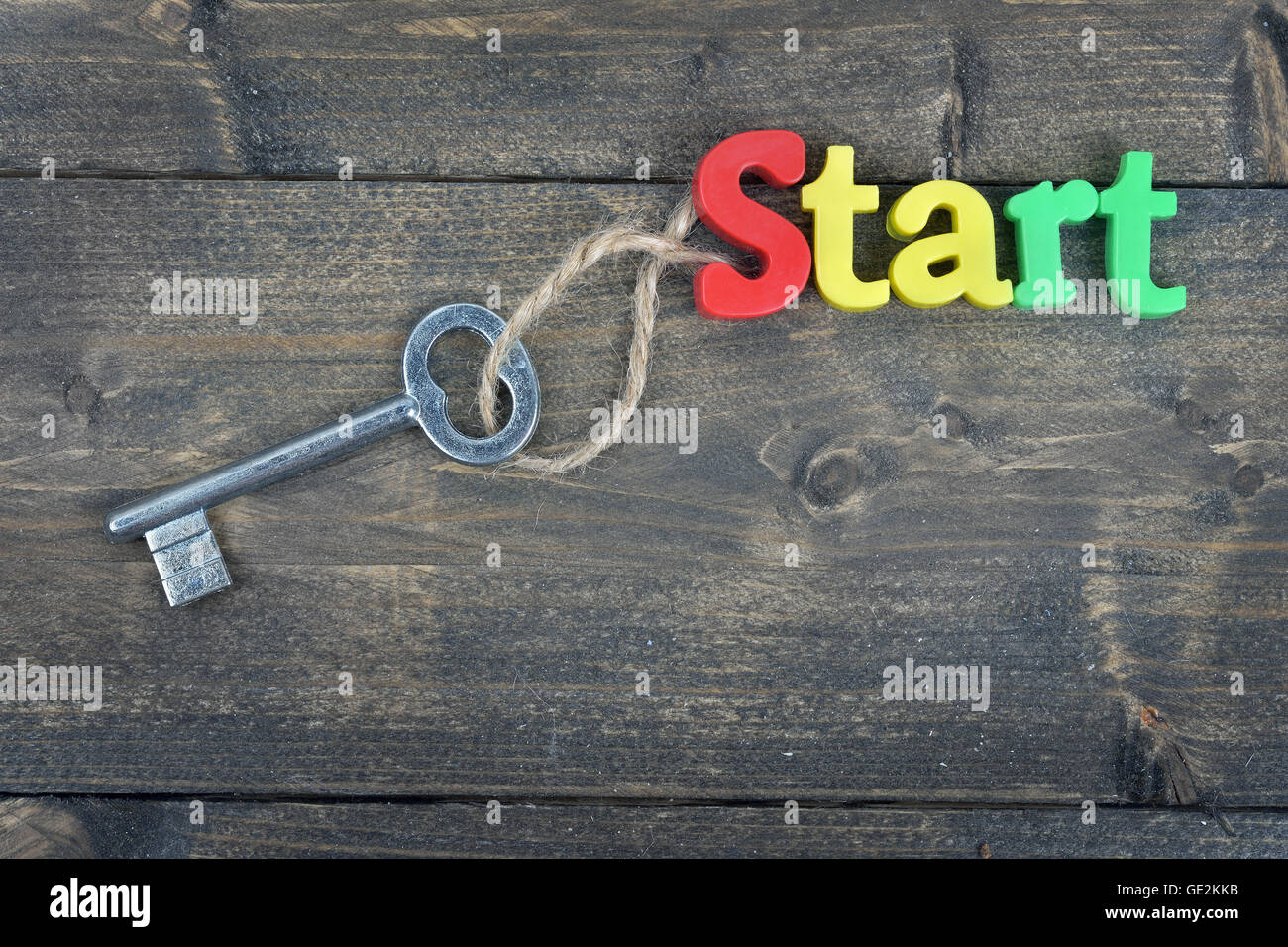 Start word on wooden table Stock Photo - Alamy