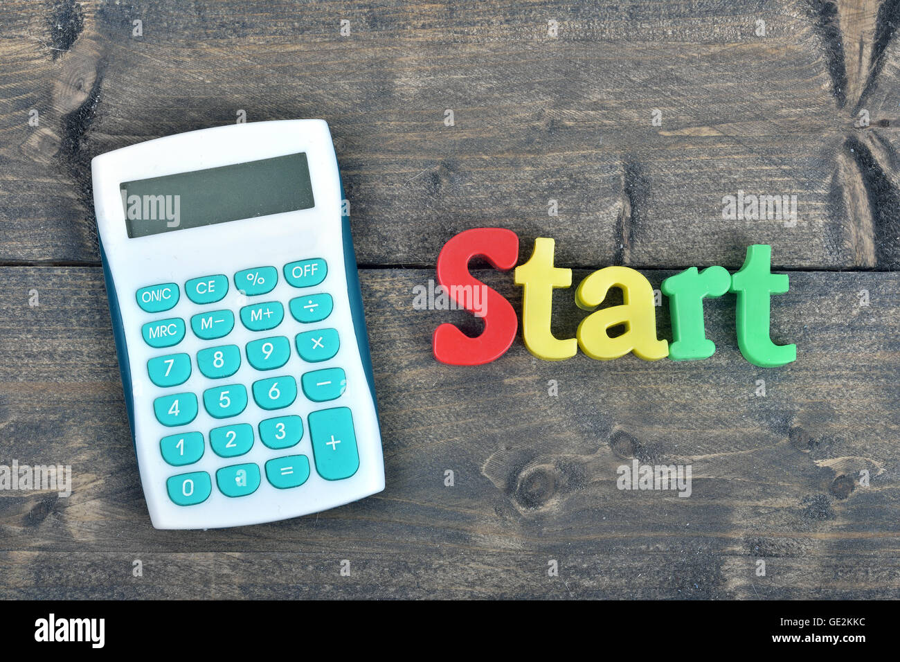 Start word on wooden table Stock Photo - Alamy