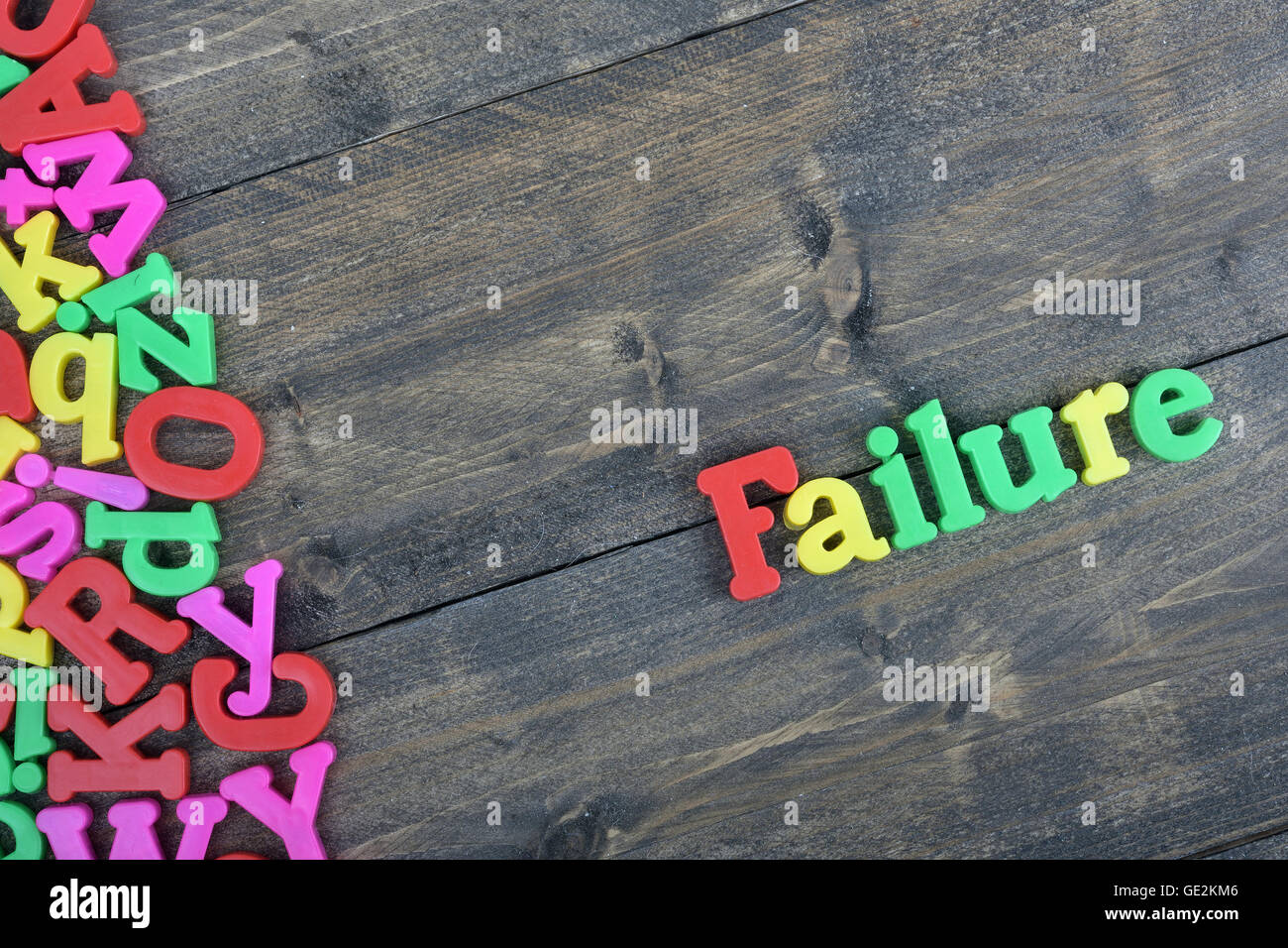 Failure word on wooden table Stock Photo - Alamy