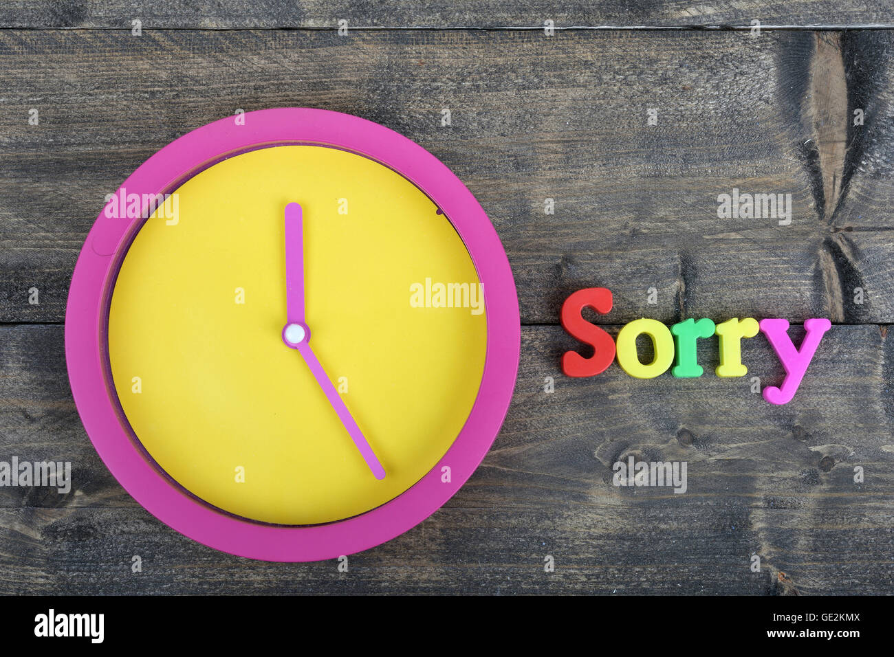 Sorry word on wooden table Stock Photo - Alamy