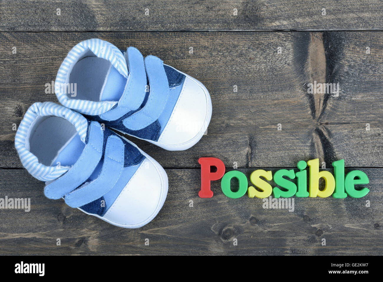 Possible word on wooden table Stock Photo - Alamy